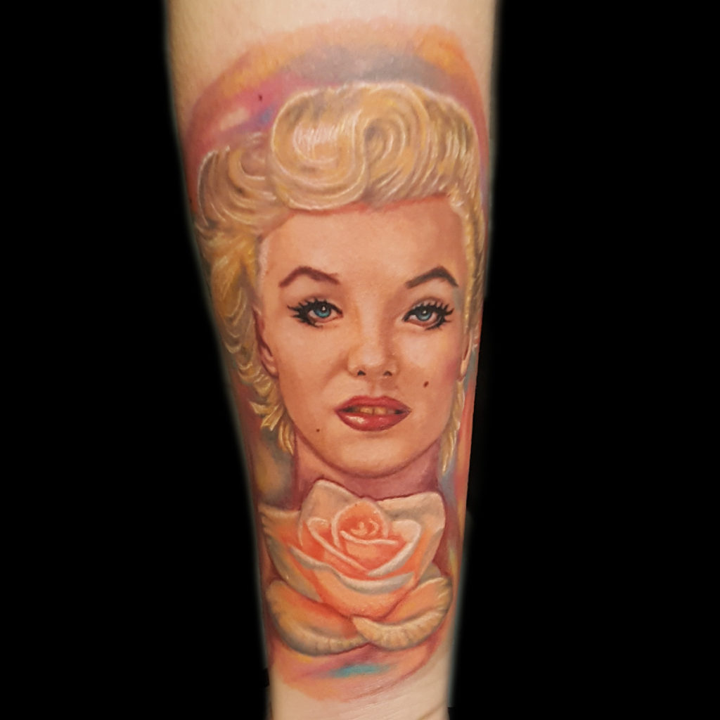 realistic floral tattoo done at Masterpiece Tattoo in San Francisco