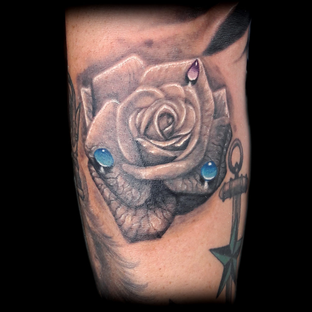 realistic floral tattoo done at Masterpiece Tattoo in San Francisco