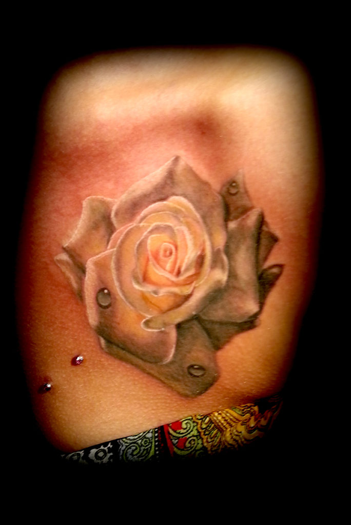 realistic floral tattoo done at Masterpiece Tattoo in San Francisco