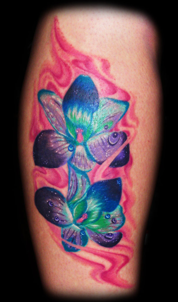 realistic floral tattoo done at Masterpiece Tattoo in San Francisco