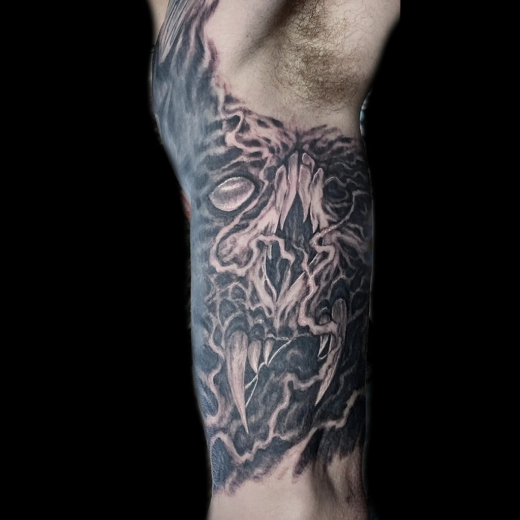 realistic skull tattoo done in San Francisco at Masterpiece Tattoo